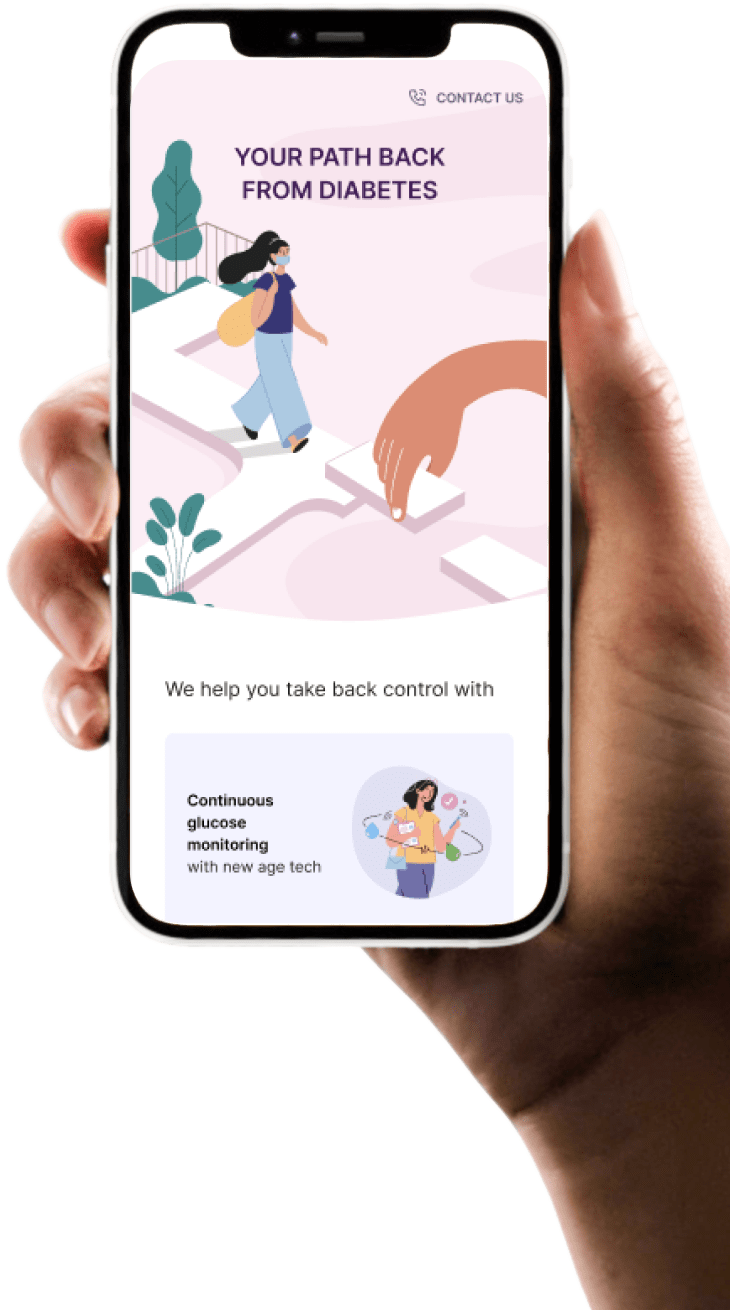 Person holding a phone with sugar.fit app on it